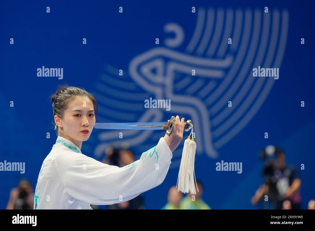 China's Tong Xin performs during women's taijijian wushu at the 19th ...