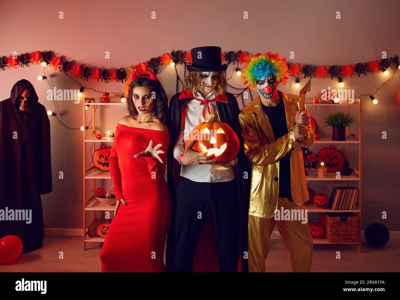 Group portrait of friends dressed up in spooky costumes at their ...