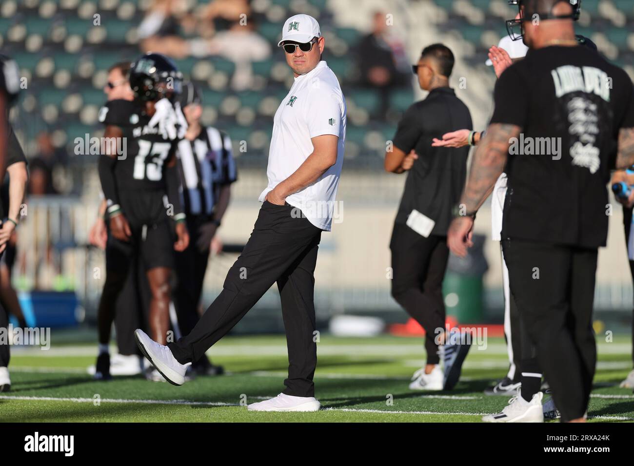 Hawaii head coach Timmy Chang is seen on the field before the start of ...