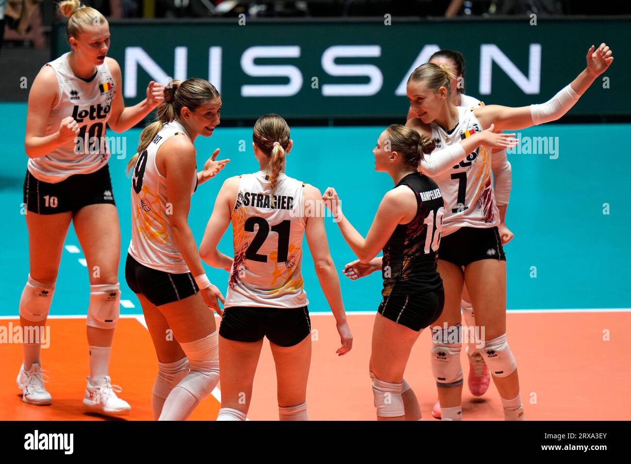 Belgian team members celebrate a point won against Turkey during the ...