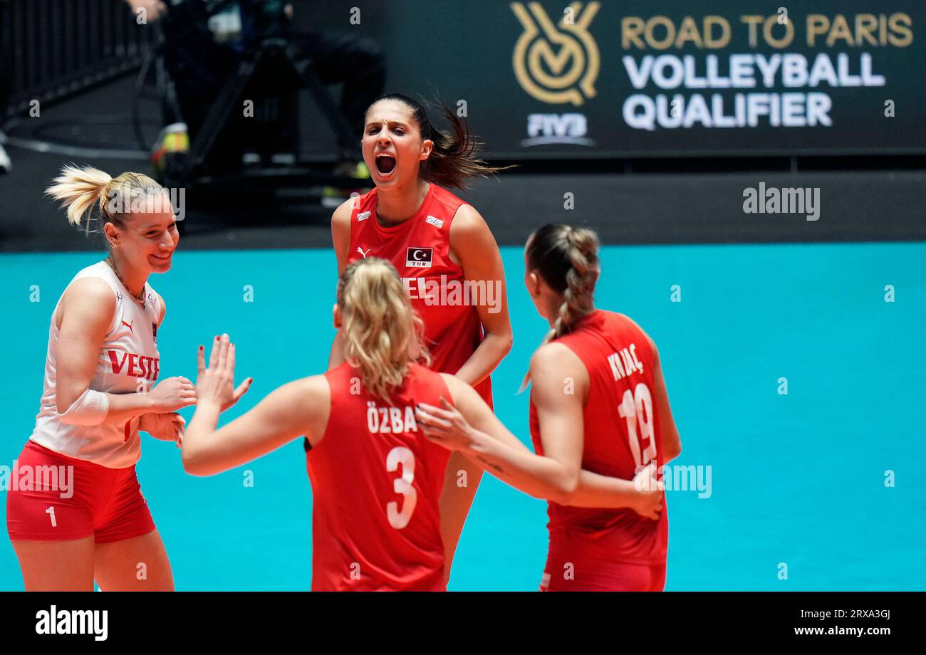Turkey's Derya Cebecioglu, top, and teammate celebrate a point won ...