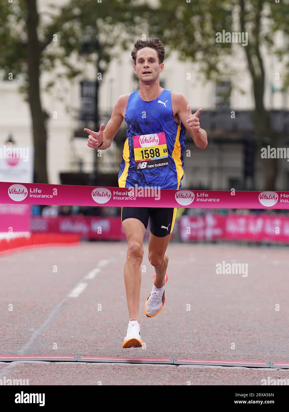 Jack Rowe crossing the finishing line on The Mall during the Vitality ...
