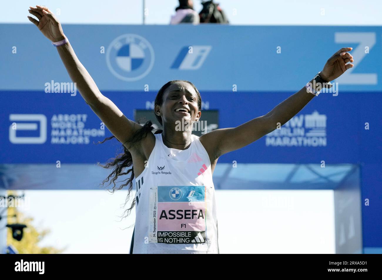 Ethiopia's Tigist Assefa celebrates as she crosses the finish line to ...