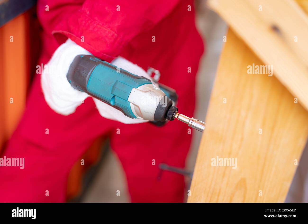 Carpenter and screwdriver hand tool. A skilled worker set to work ...
