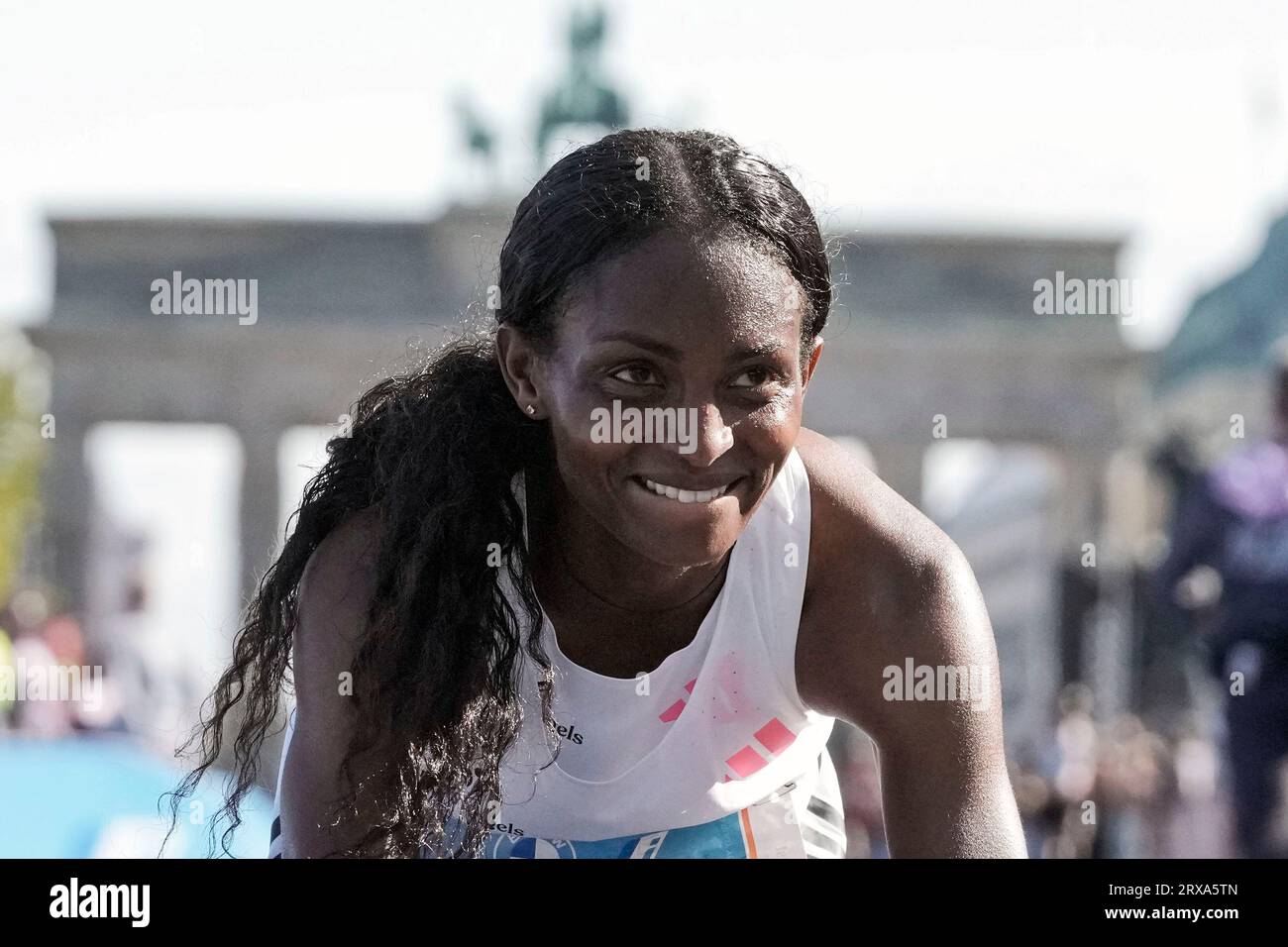 Ethiopia's Tigist Assefa smiles after she crossed the finish line to ...