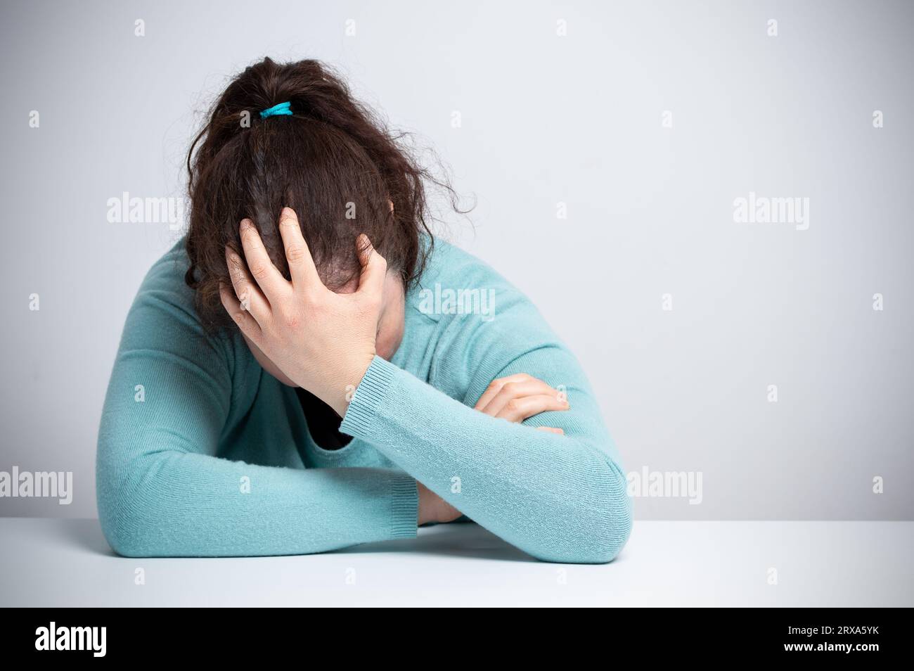 Abused woman crying home hi-res stock photography and images - Alamy