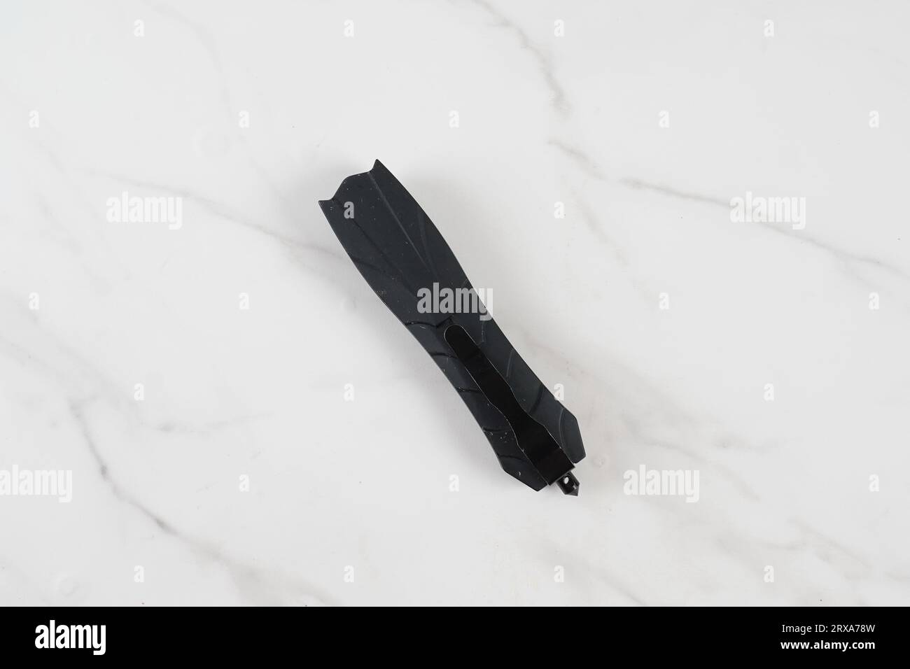 Switchblade (automatic) out-the-front (OTF)pocket knife in folded ...
