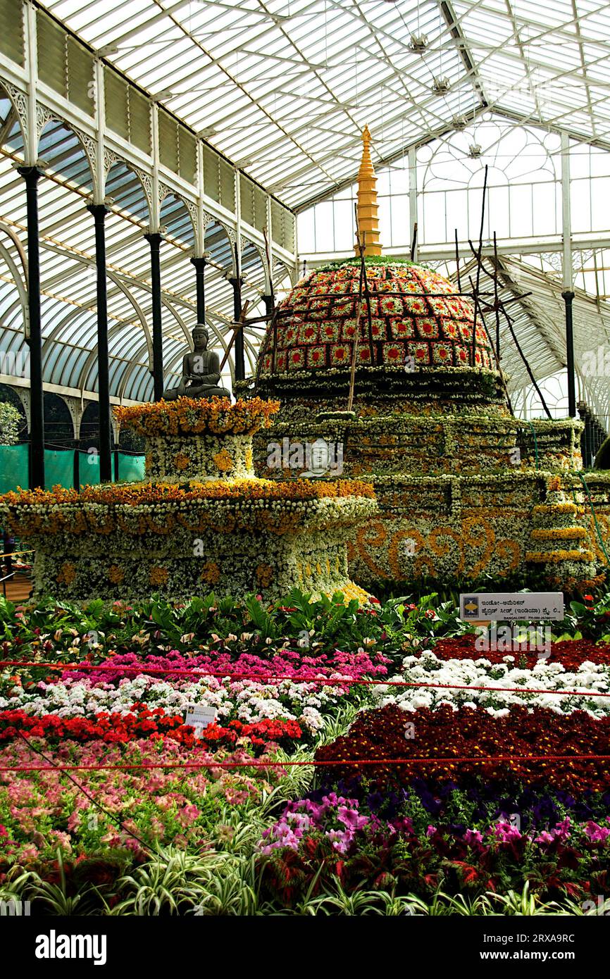 View of floral stupa and statue of Buddha at Republic Day Flower Show ...