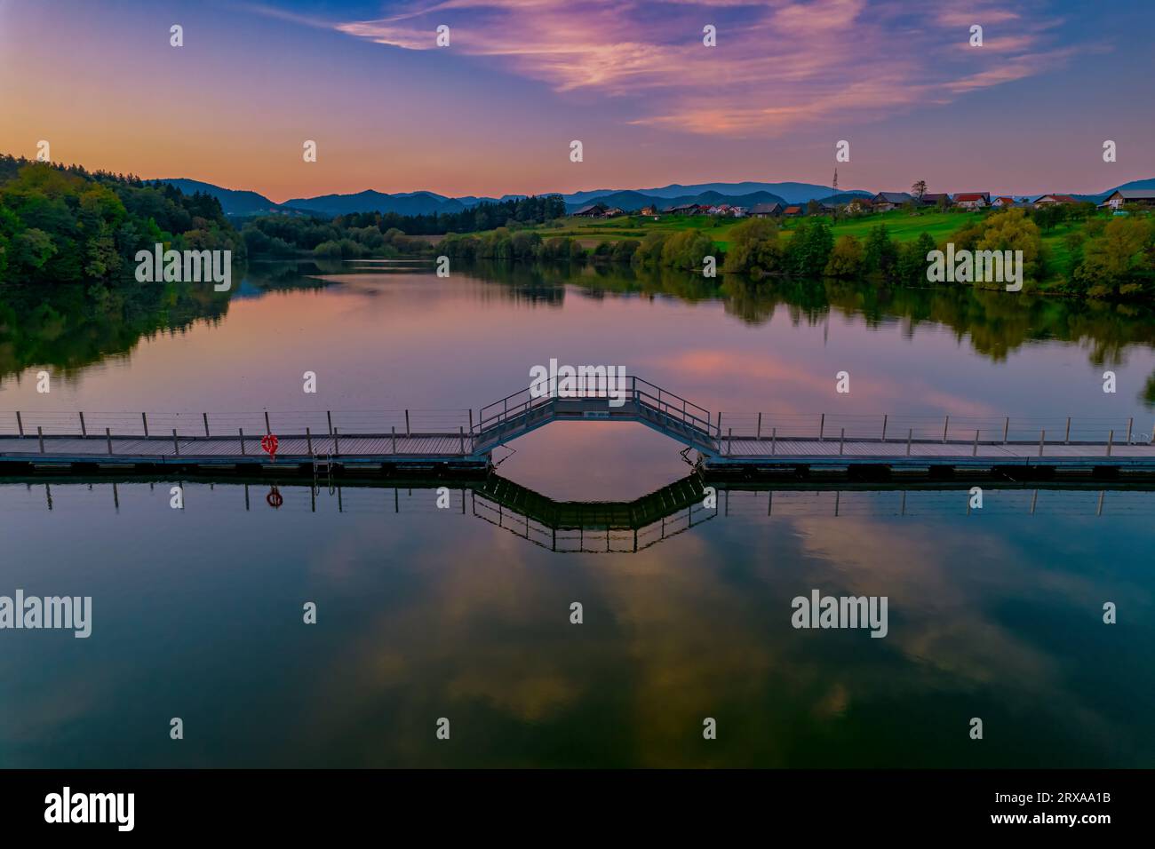 Misty lake with magic reflection Stock Photo - Alamy