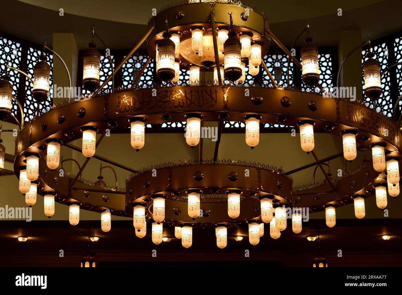 A large circular mosque chandelier ceiling light with lamps and made of ...