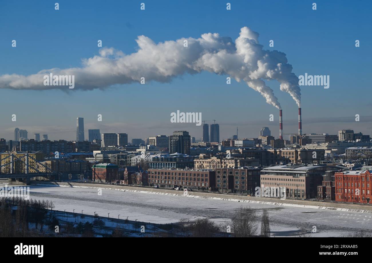 January 7, 2023, Moscow, Russia. Steam from the pipes of a thermal ...
