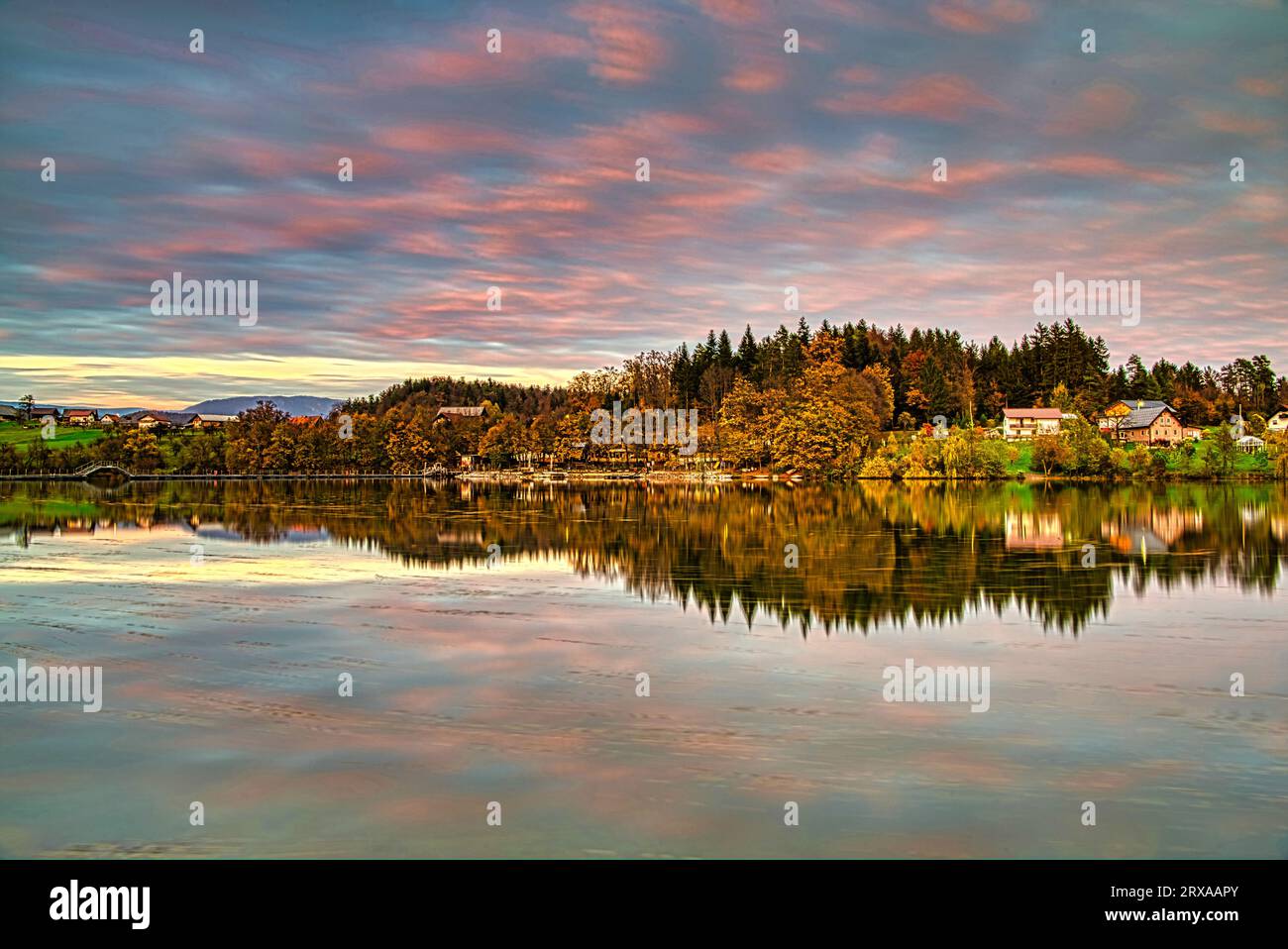 Misty lake with magic reflection Stock Photo - Alamy