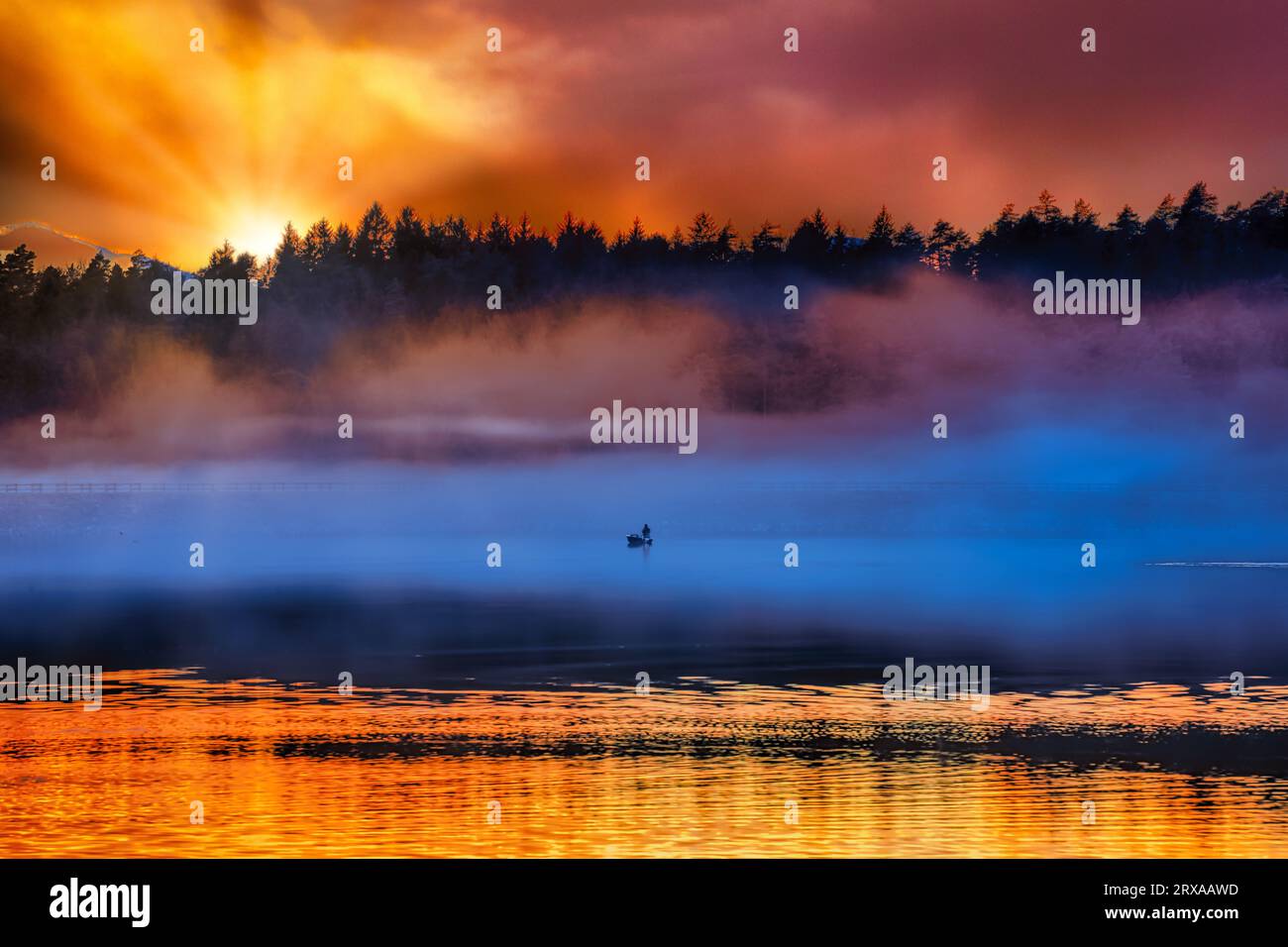 Misty lake with magic reflection Stock Photo - Alamy