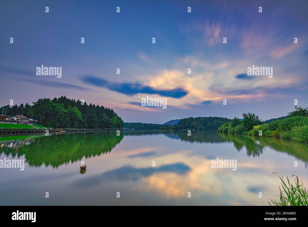 Misty lake with magic reflection Stock Photo - Alamy