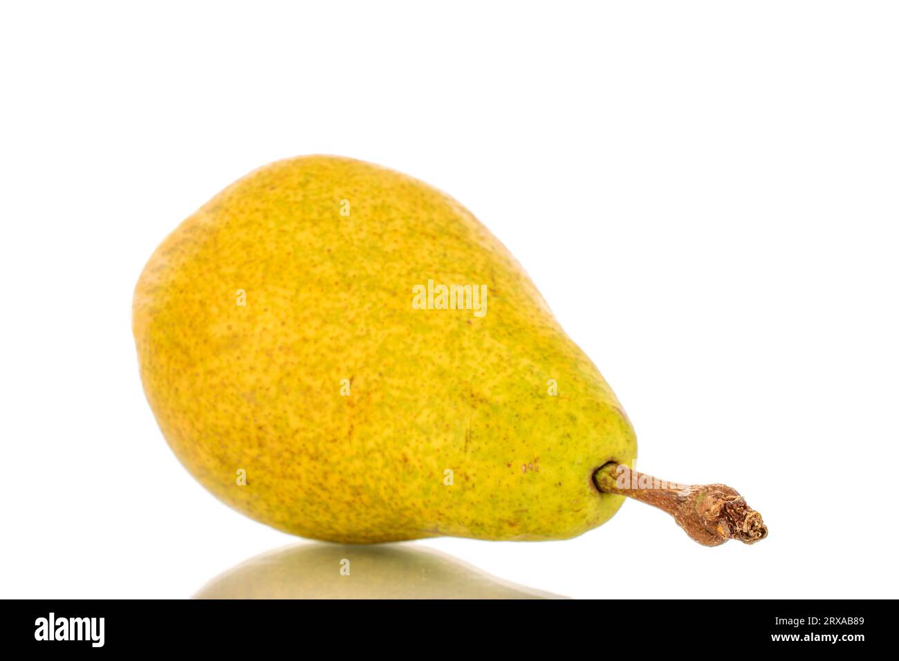 One sweet yellow pear, macro, isolated on white background Stock Photo ...