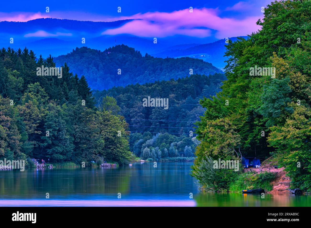 Misty lake with magic reflection Stock Photo - Alamy