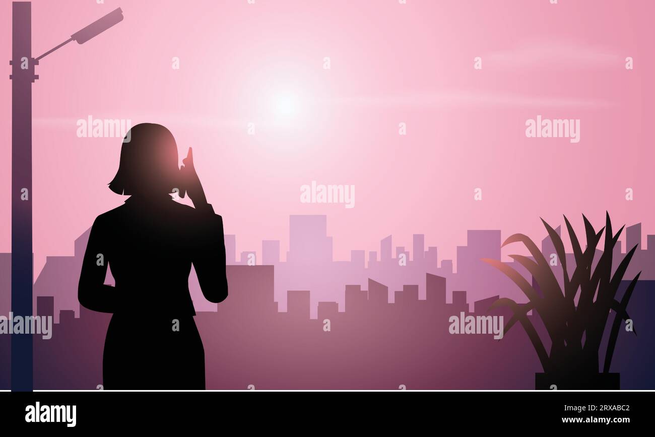 Silhouette of a professional woman in a suit making a telephone call ...