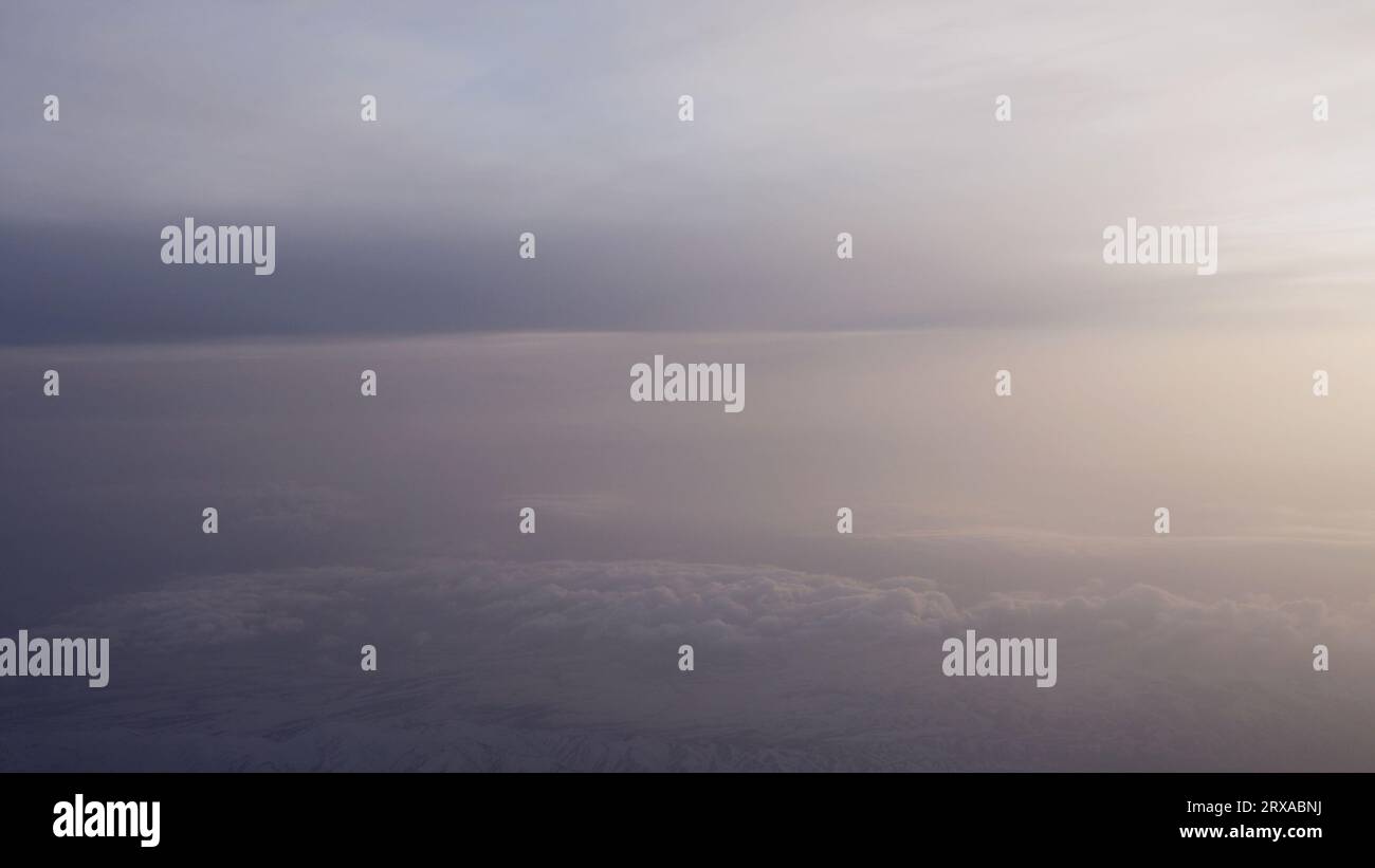 Airplane shot, flying in haze clouds over europe, travel content Stock ...