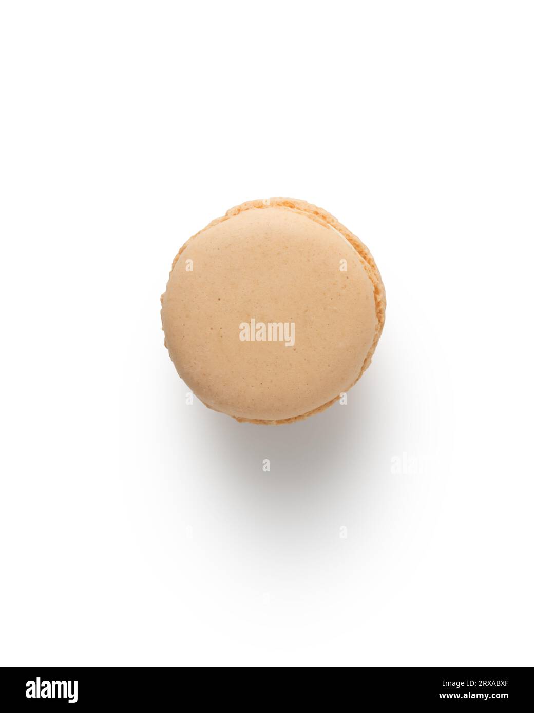 Beige french macaron top view isolated on white background with shadow ...