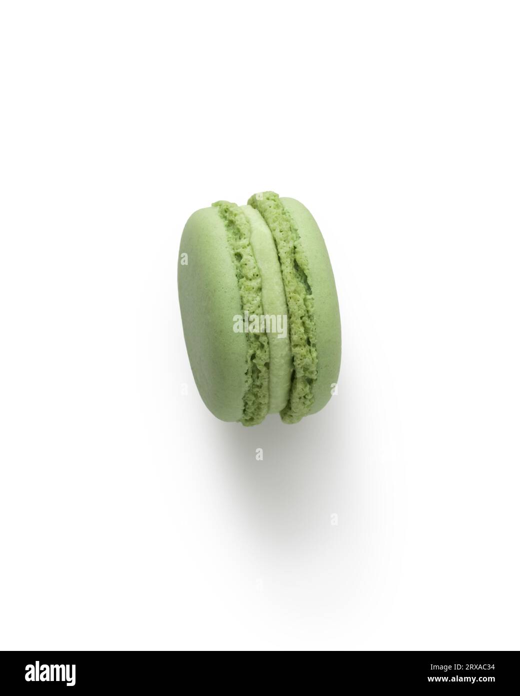 Green french macaron top view isolated on white background with shadow ...