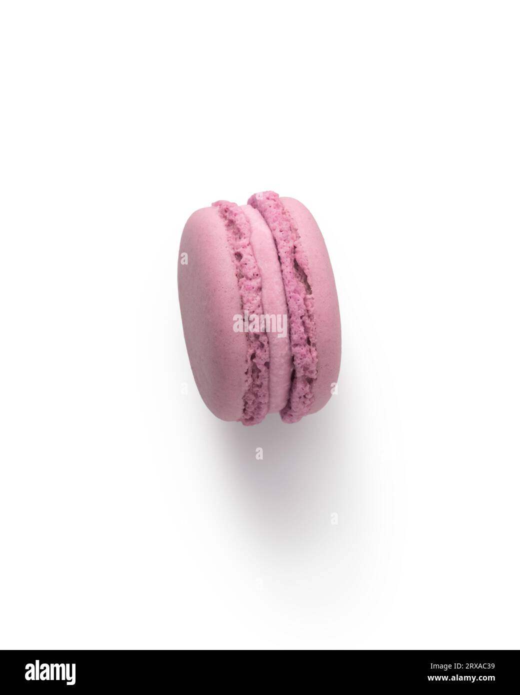Pink french macaron top view isolated on white background with shadow ...