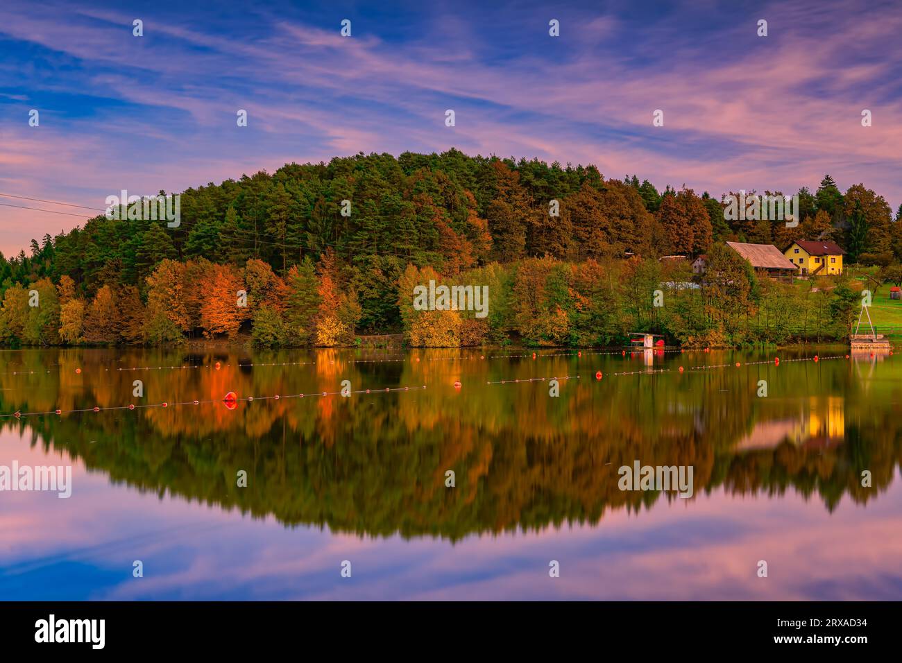 Misty lake with magic reflection Stock Photo - Alamy