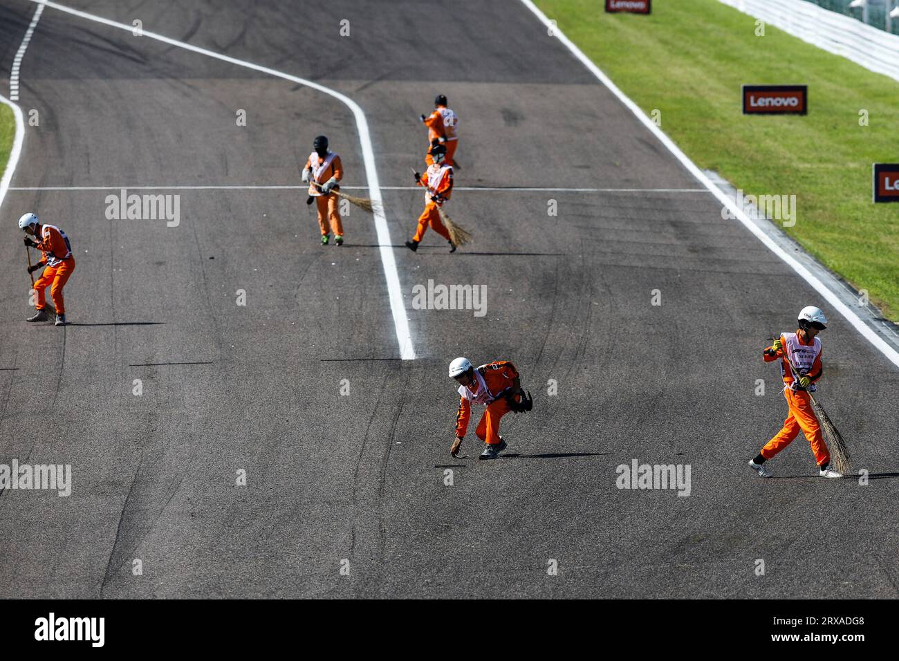 Suzuka, Japan. 24th Sep, 2023. Track marshals remove debris, F1 Grand ...