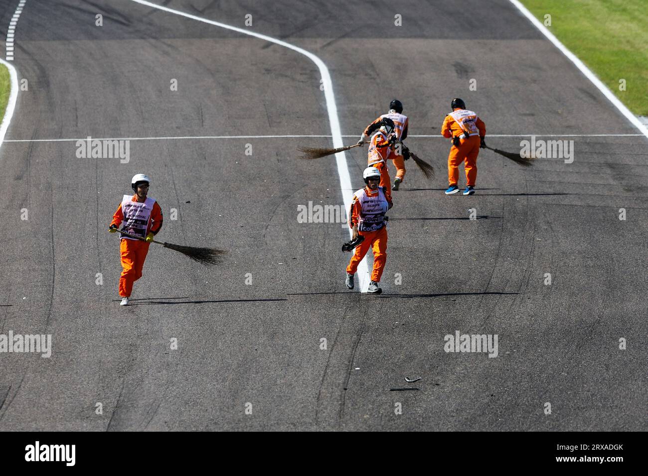 Suzuka, Japan. 24th Sep, 2023. Track marshals remove debris, F1 Grand ...