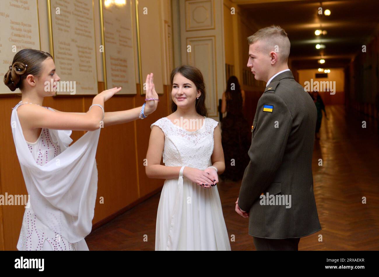 Girls graduates of Ivan Bogun military lyceum, communicating in a ...