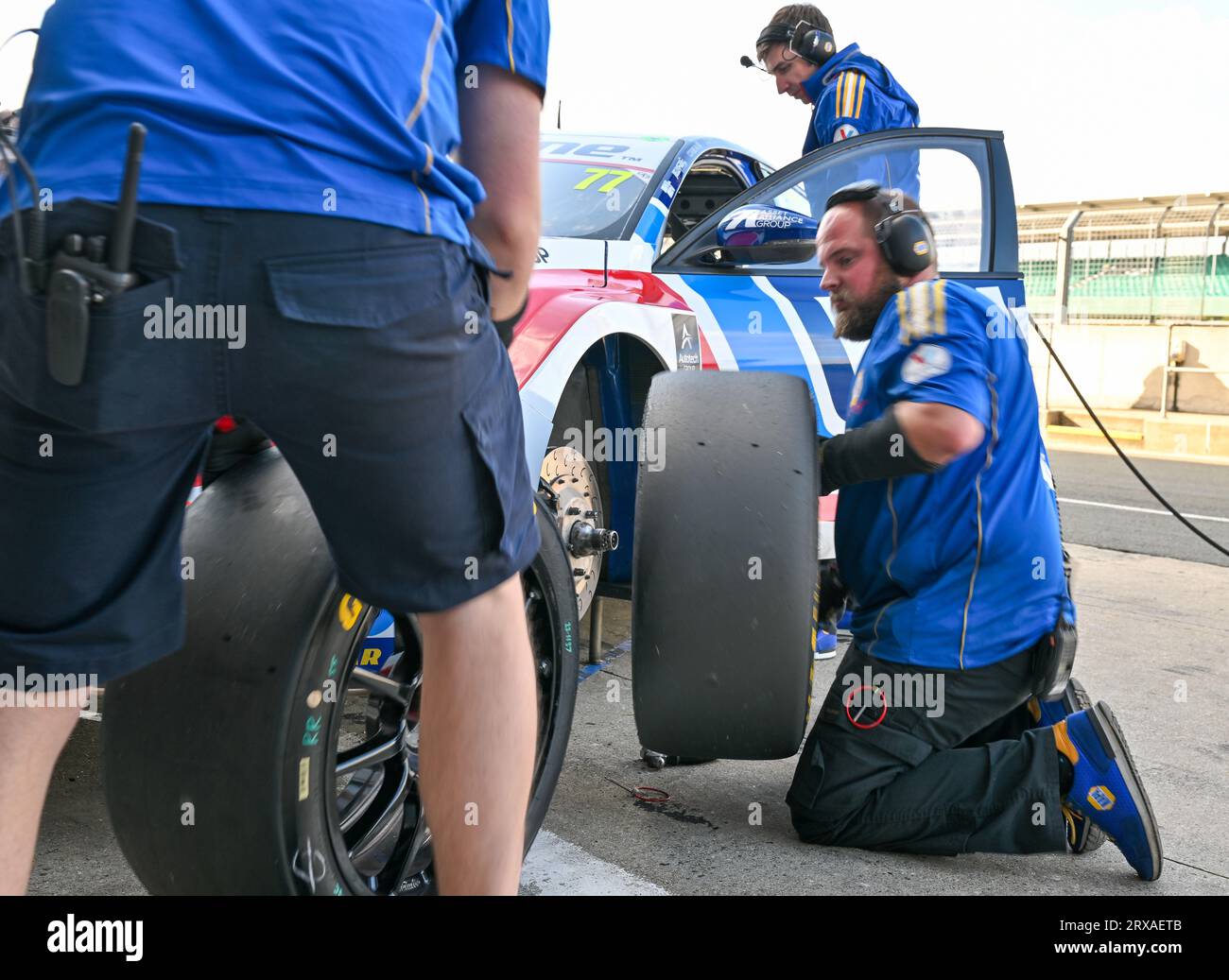 Silverstone, UK. 23rd Sep, 2023. Mechanics work on the car of Sam ...