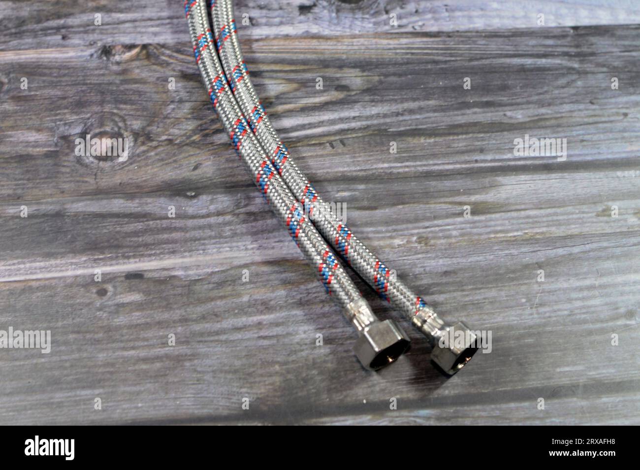 Flexible rubber hoses hi-res stock photography and images - Alamy