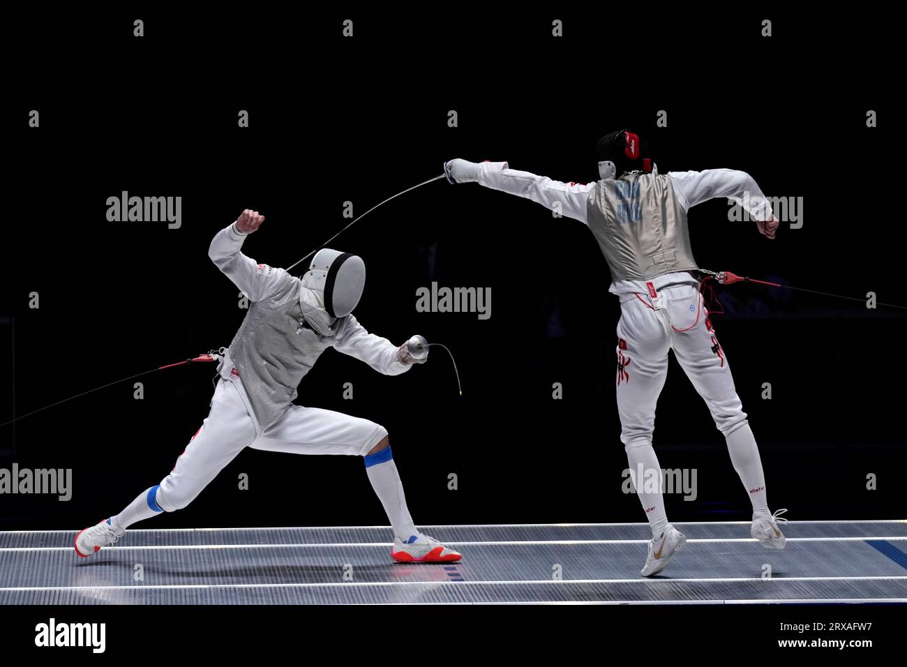 Haiwei Chen of China, left, and Chun Yin Ryan Choi of Hong Kong compete ...