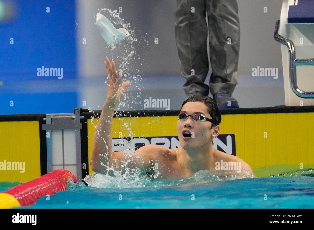 China's Wang Shun celebrates after winning the men's 200 meter ...