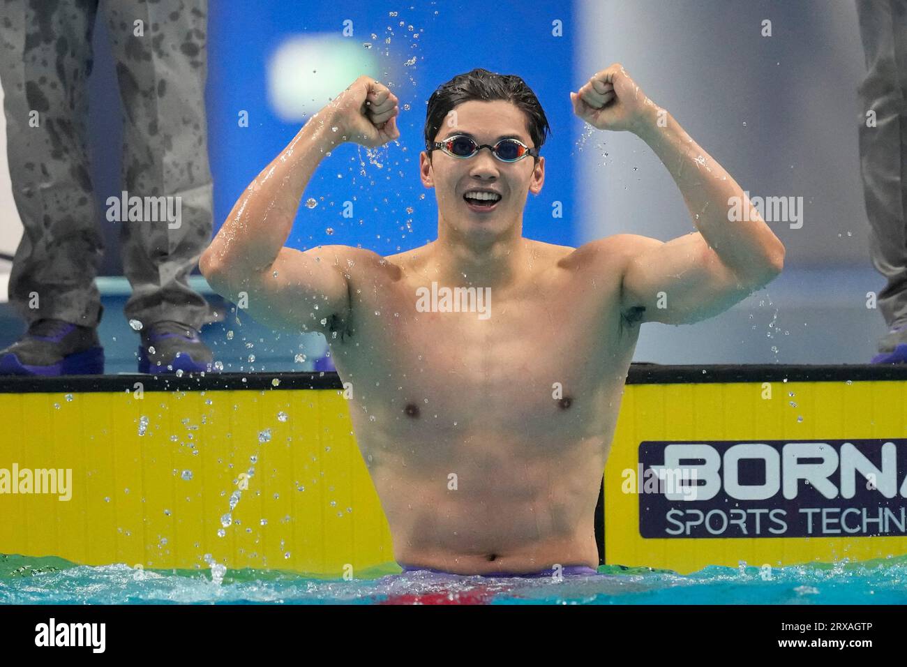China's Wang Shun celebrates after winning the men's 200 meter ...