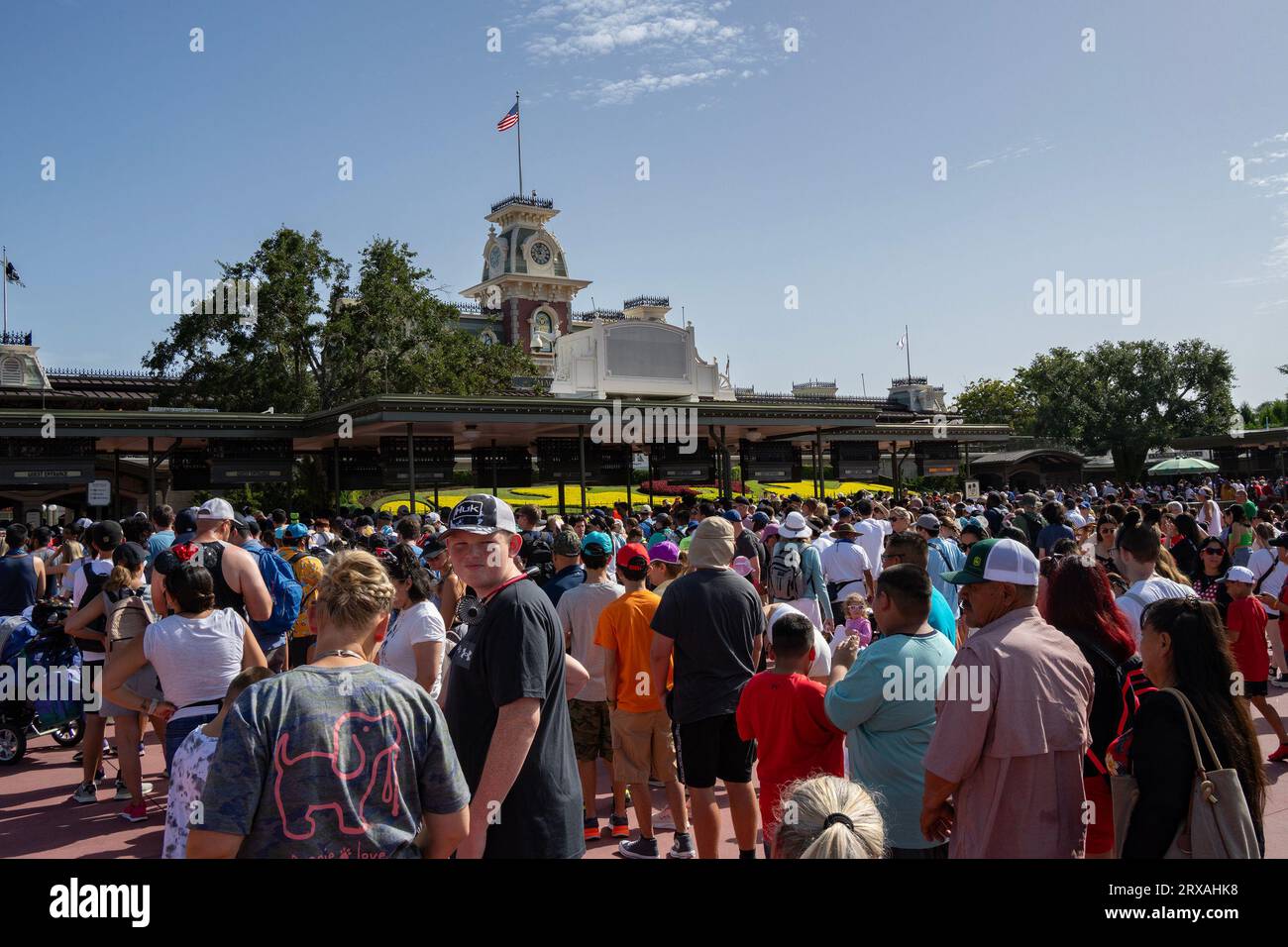 Orlando, USA - July 25th, 2023: Hundreds of people standing in lines in ...