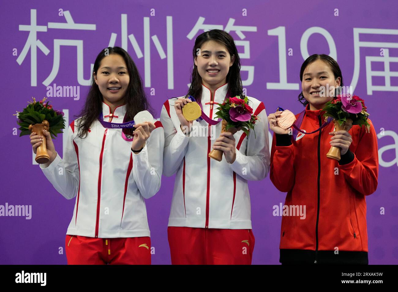 Medalists from left to right, silver Yu Liyan of China, gold Zhang ...