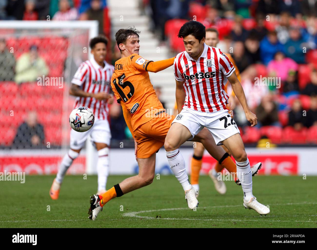 Hull City's Tyler Morton (left) and Stoke City's Bae Jun-Ho battle for ...