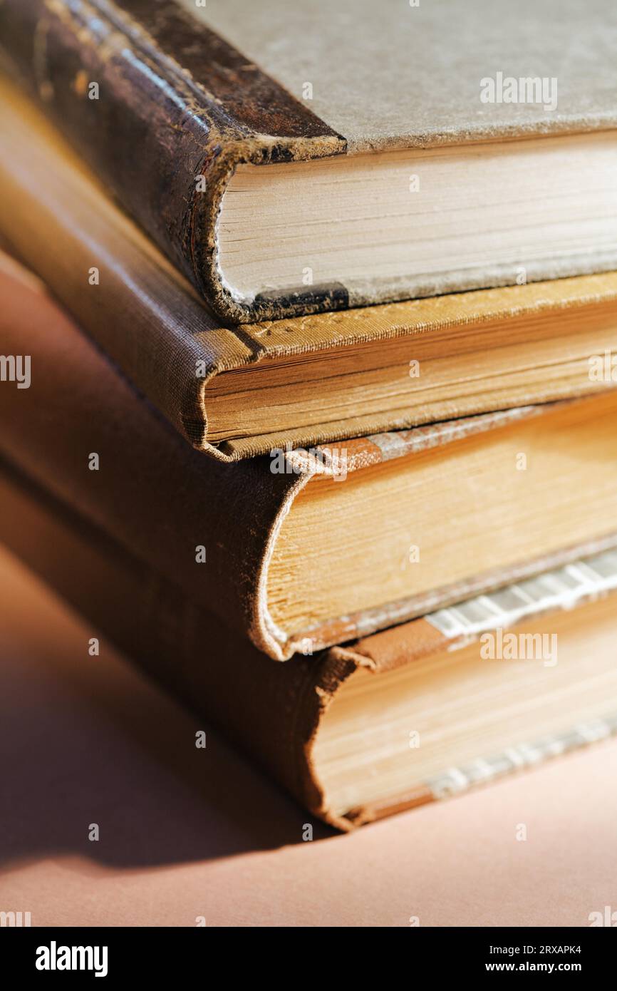 Stack of old books. Short depth of field Stock Photo - Alamy