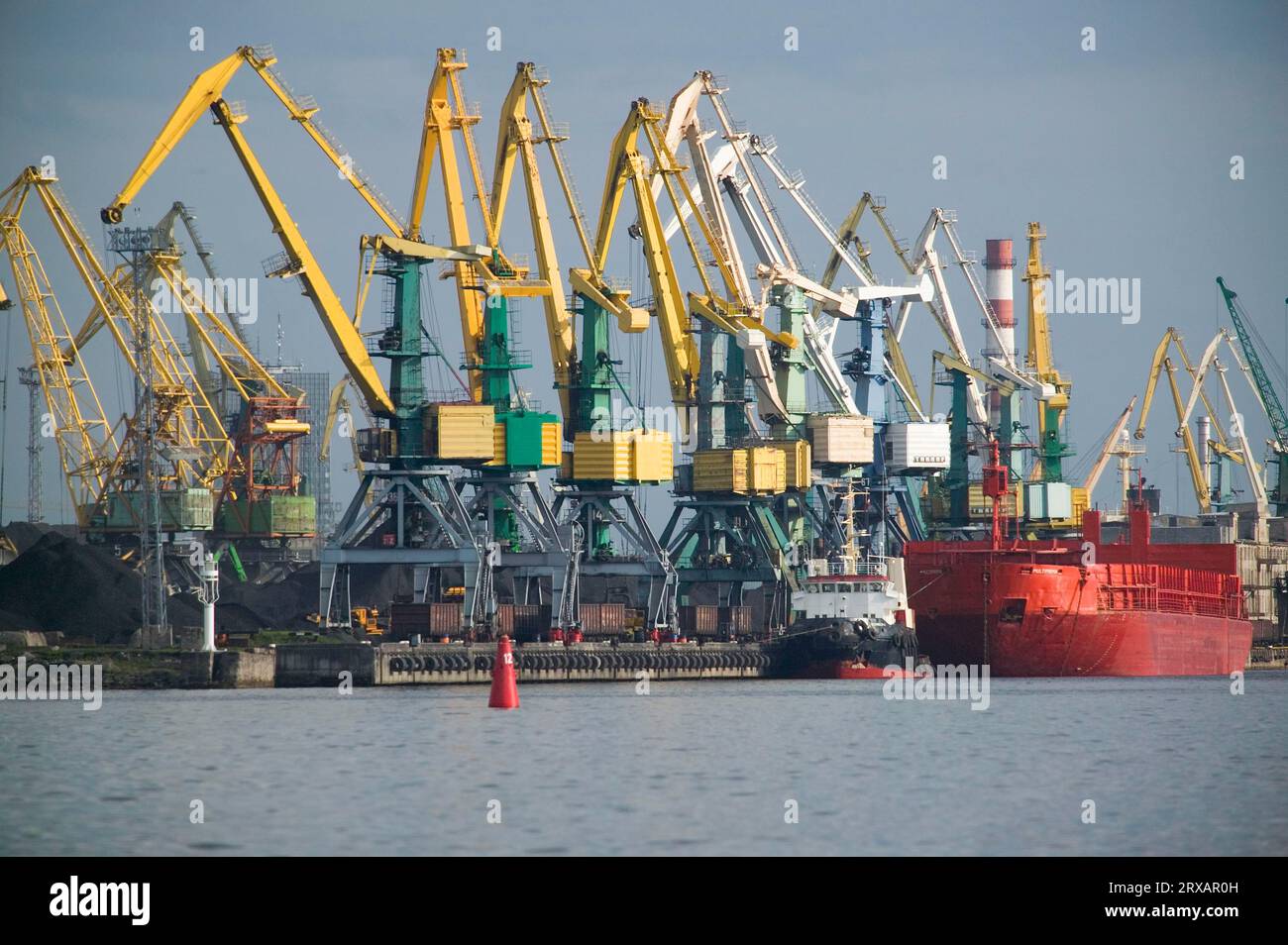 Container ship loading at the container terminal in Riga Stock Photo ...
