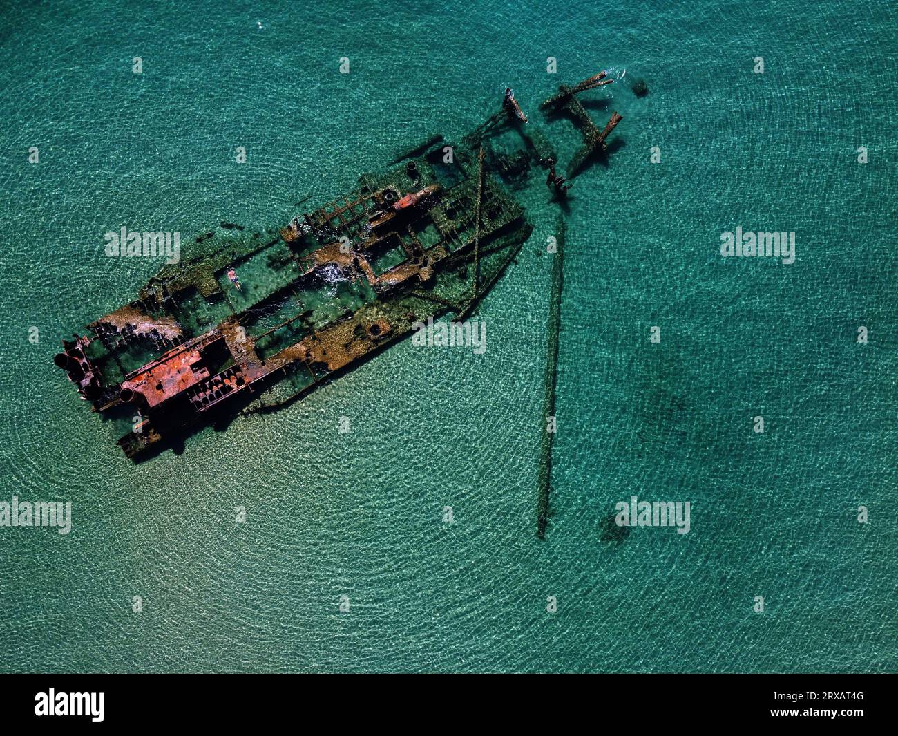 Greece, People dive into the crystal clear waters of the Mediterranean ...