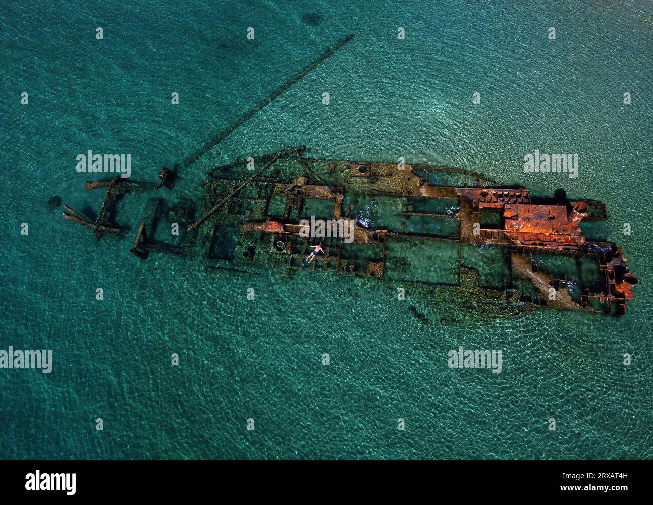 Greece, People dive into the crystal clear waters of the Mediterranean ...