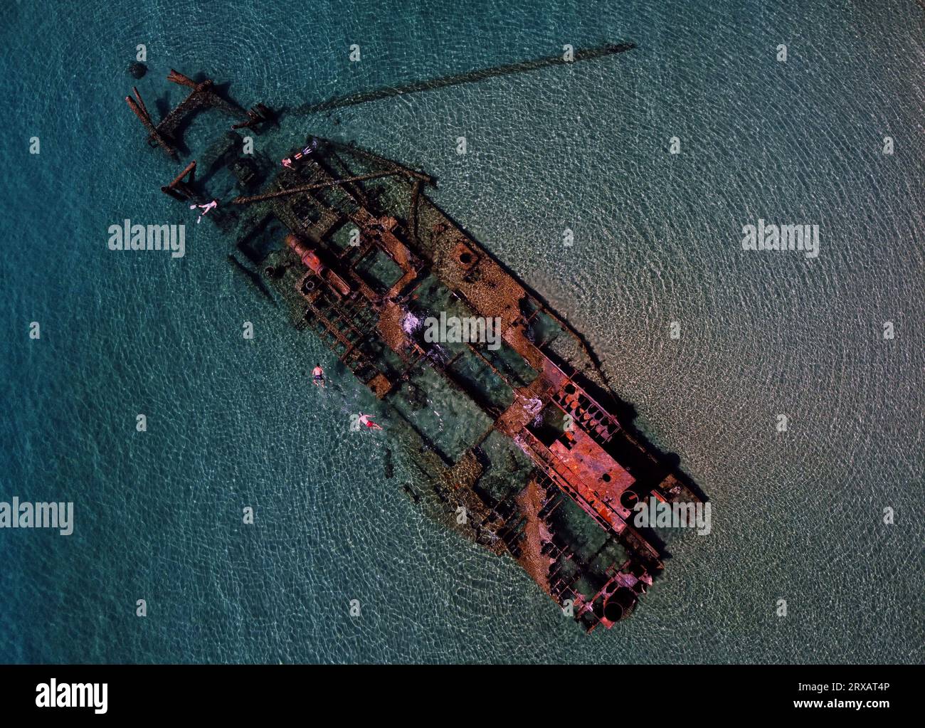 Greece, People dive into the crystal clear waters of the Mediterranean ...