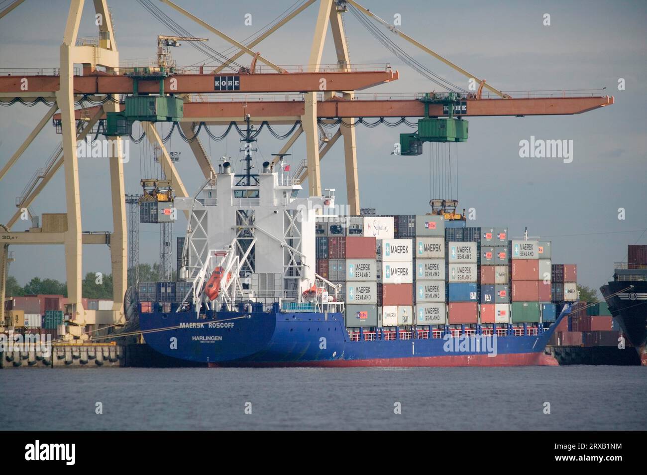 Container ship loading at the container terminal in Riga Stock Photo ...