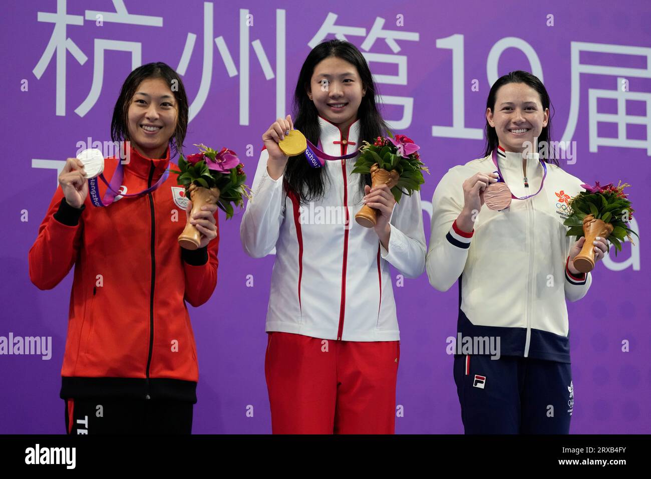 Medalists, from left to right, Japan's Satomi Suzuki, silver, China's Tang Qianting, gold, and ...