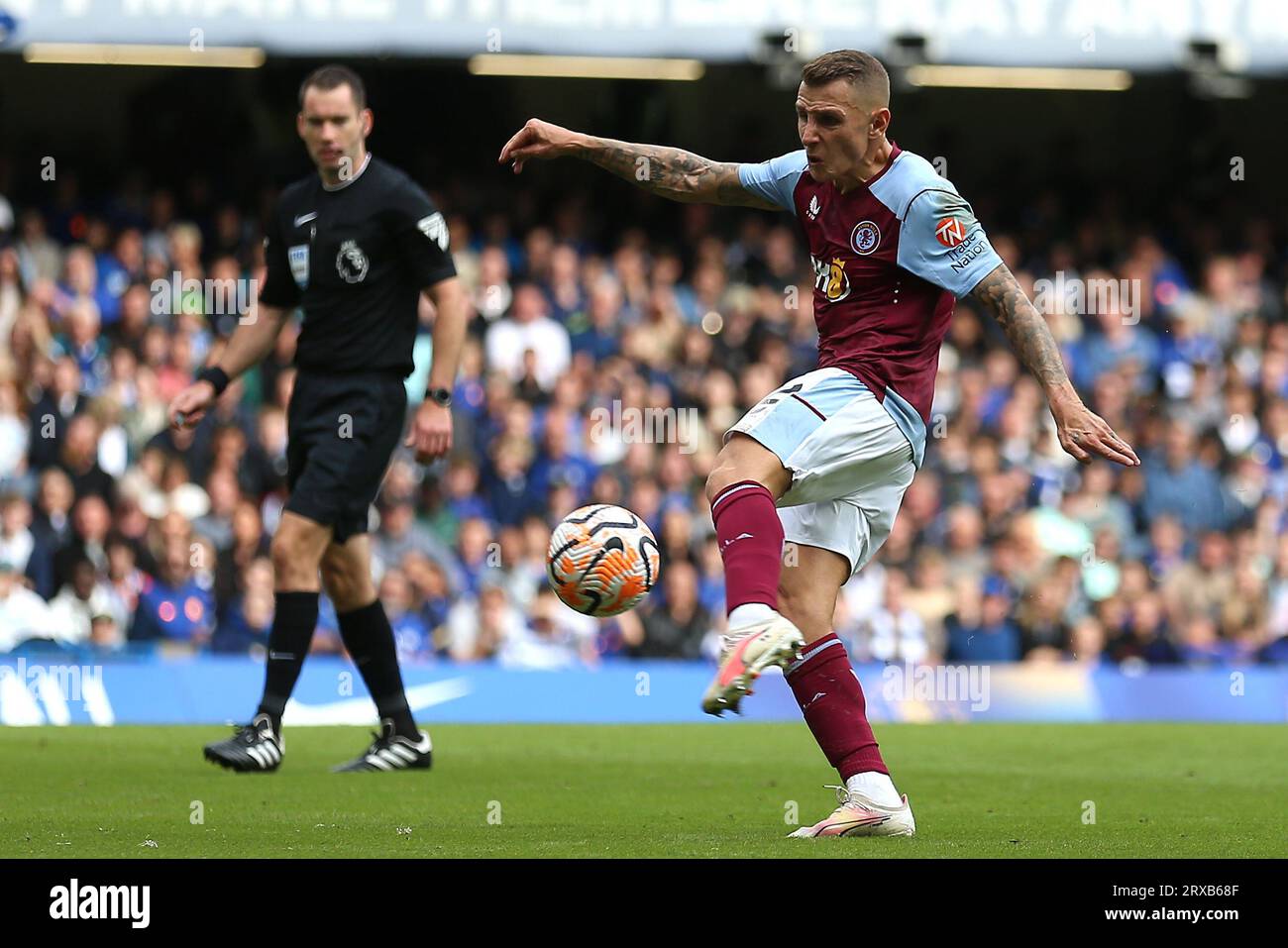 Aston Villa's Lucas Digne attempts a shot on goal during the Premier League match at Stamford ...