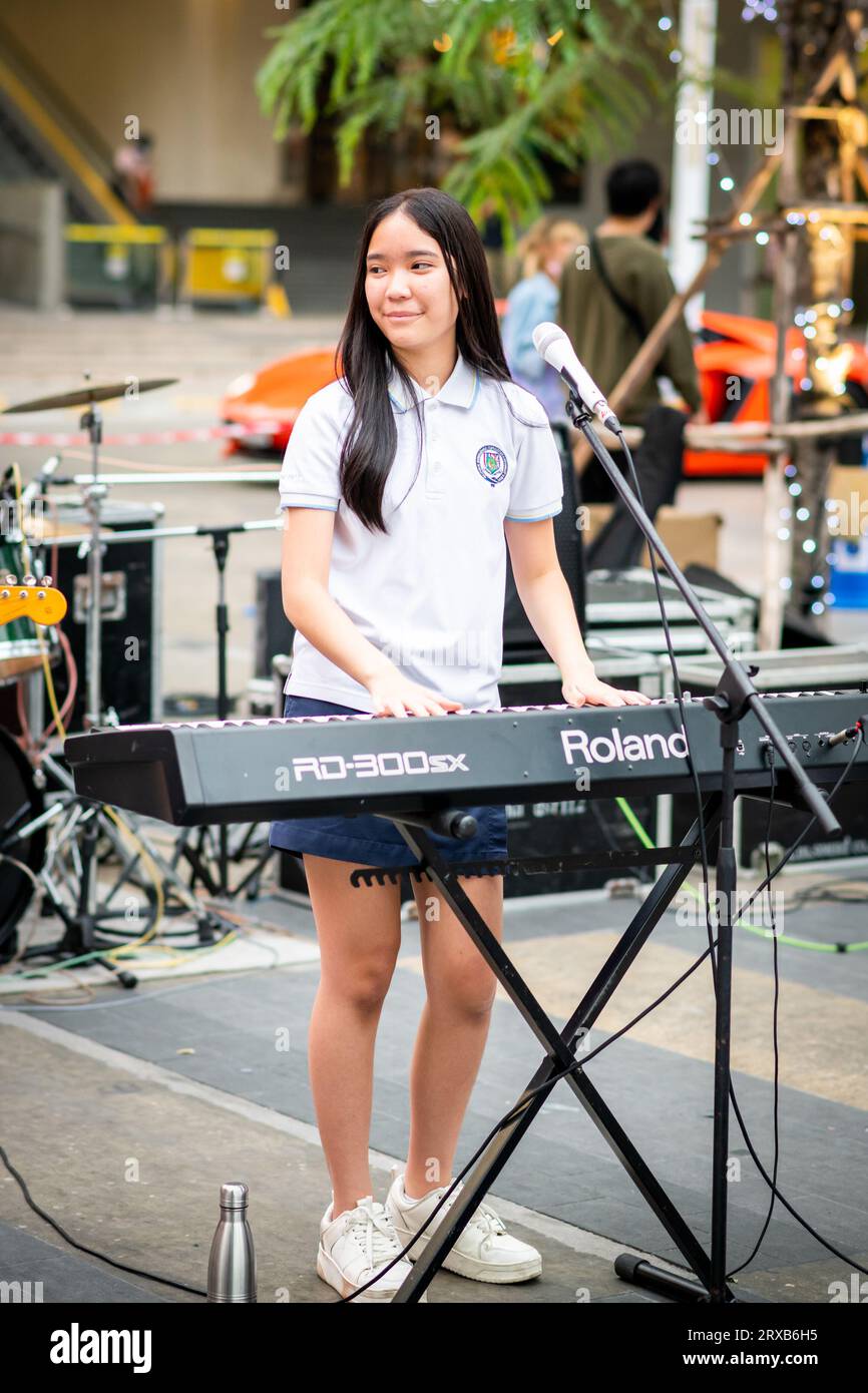 A cool young Thai band perform in Siam Sq. Siam, Bangkok, Thailand ...