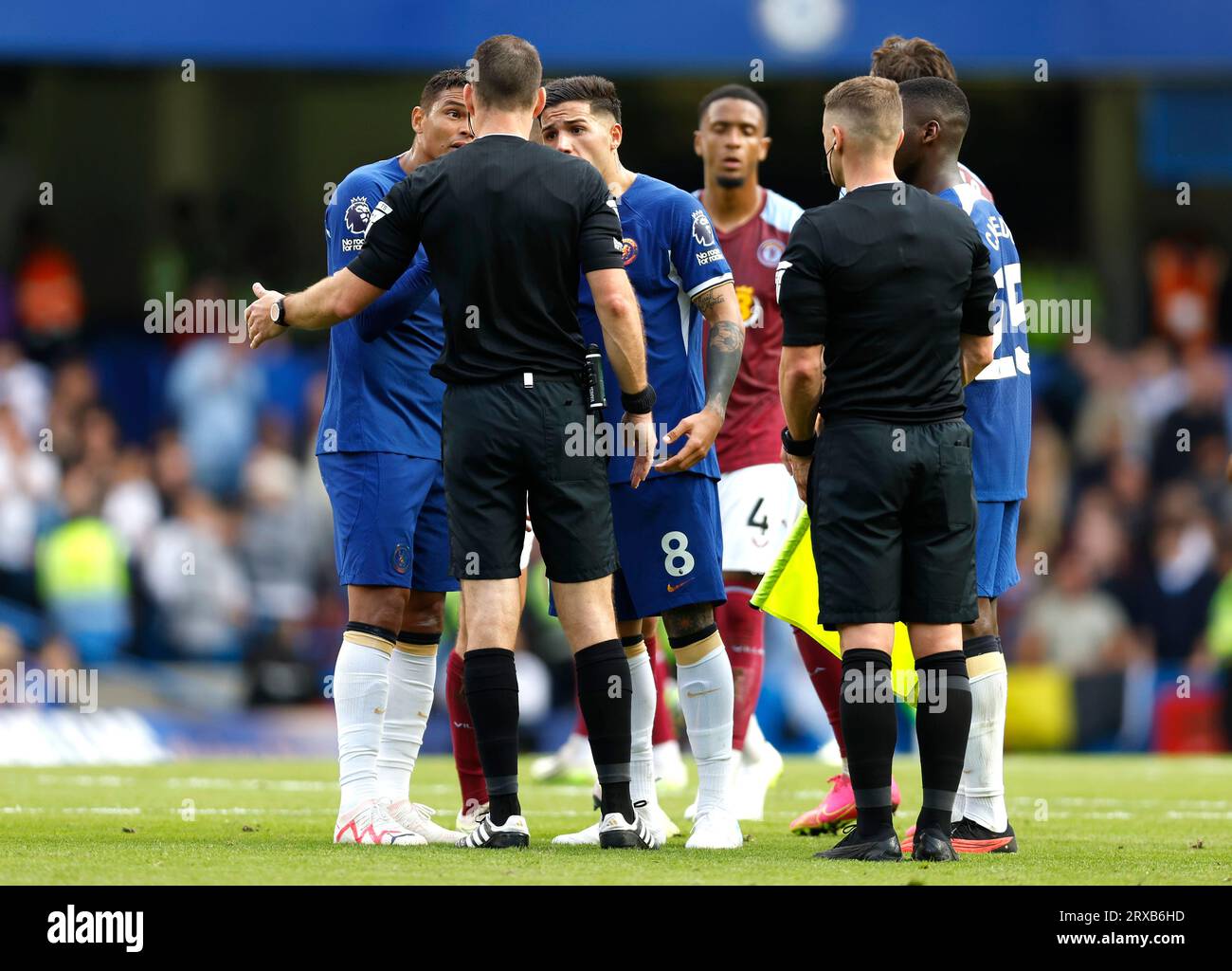 Chelsea players speak to referee Jarred Gillett at the end of the first ...