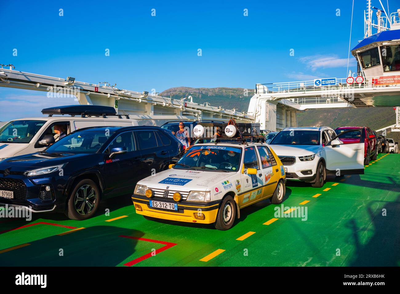 Fodness, Norway, Jun 24, 2023: Patons ride the auto ferry from Fodnes ...