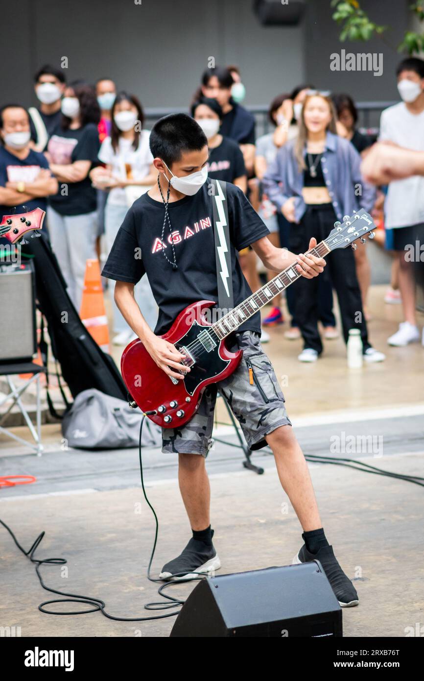 A cool young Thai band perform in Siam Sq. Siam, Bangkok, Thailand ...