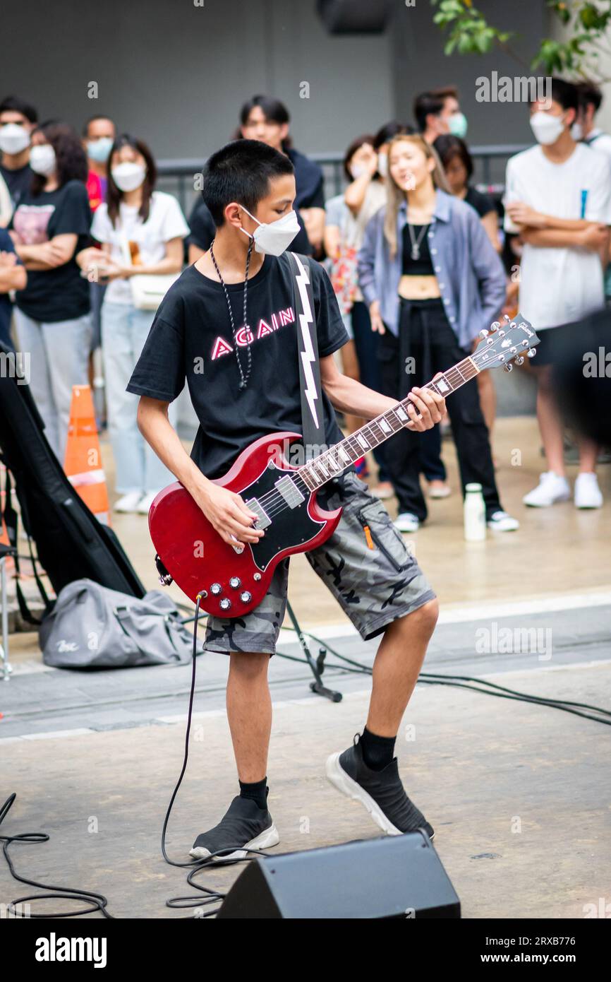 A cool young Thai band perform in Siam Sq. Siam, Bangkok, Thailand ...